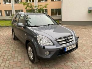 Blue Honda CR-V 2006 in Jelgava, with an engine capacity of 2.00 L and mileage of 317 thousand km for 1850 €, photo 2 on AUTOMOTO.COM.LV