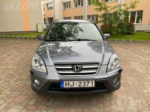 Blue Honda CR-V 2006 in Jelgava, with an engine capacity of 2.00 L and mileage of 317 thousand km for 1850 €, photo 3 on AUTOMOTO.COM.LV