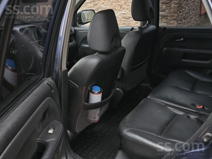Blue Honda CR-V 2006 in Riga, with an engine capacity of 2.00 L and mileage of 237 thousand km for 3150 €, photo 9 on AUTOMOTO.COM.LV