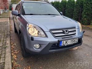 Blue Honda CR-V 2006 in Jekabpils, with an engine capacity of 2.00 L and mileage of 392 thousand km for 3000 €, photo 4 on AUTOMOTO.COM.LV