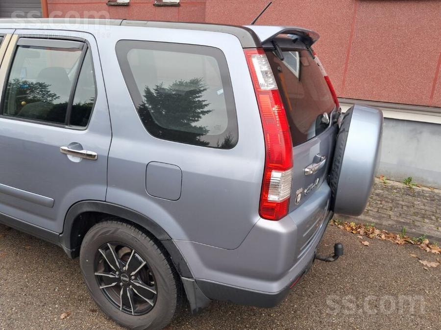 Blue Honda CR-V 2006 in Jekabpils, with an engine capacity of 2.00 L and mileage of 392 thousand km for 3000 €, photo 7 on AUTOMOTO.COM.LV