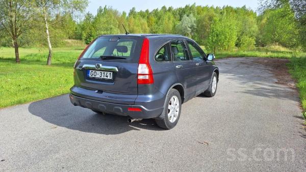 Blue Honda CR-V 2007 in Riga, with an engine capacity of 2.00 L and mileage of 167 thousand km for 3900 €, photo 3 on AUTOMOTO.COM.LV