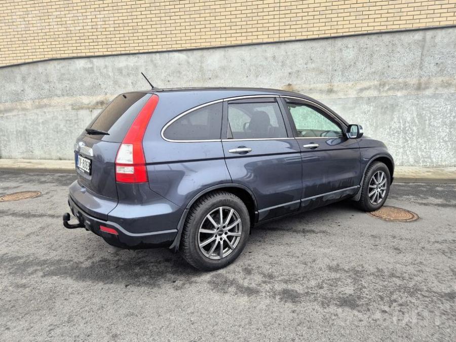 Blue Honda CR-V 2007 in Riga, with an engine capacity of 2.20 L and mileage of 230 thousand km for 5500 €, photo 3 on AUTOMOTO.COM.LV