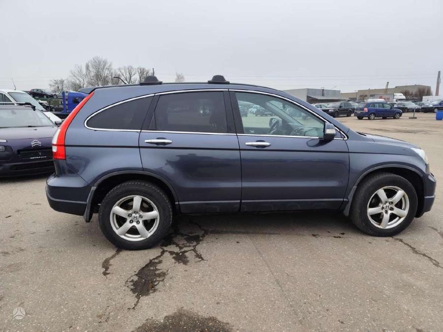 Blue Honda CR-V 2007 in Marijampole, with an engine capacity of 2.00 L and mileage of 233 thousand km for 4600 €, photo 6 on AUTOMOTO.COM.LV