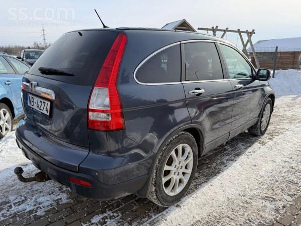 Blue Honda CR-V 2007 in Talsi, with an engine capacity of 2.20 L and mileage of 306 thousand km for 5390 €, photo 7 on AUTOMOTO.COM.LV