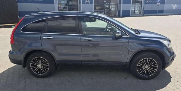Blue Honda CR-V 2007 in Siauliai, with an engine capacity of 2.00 L and mileage of 236 thousand km for 4200 €, photo 5 on AUTOMOTO.COM.LV