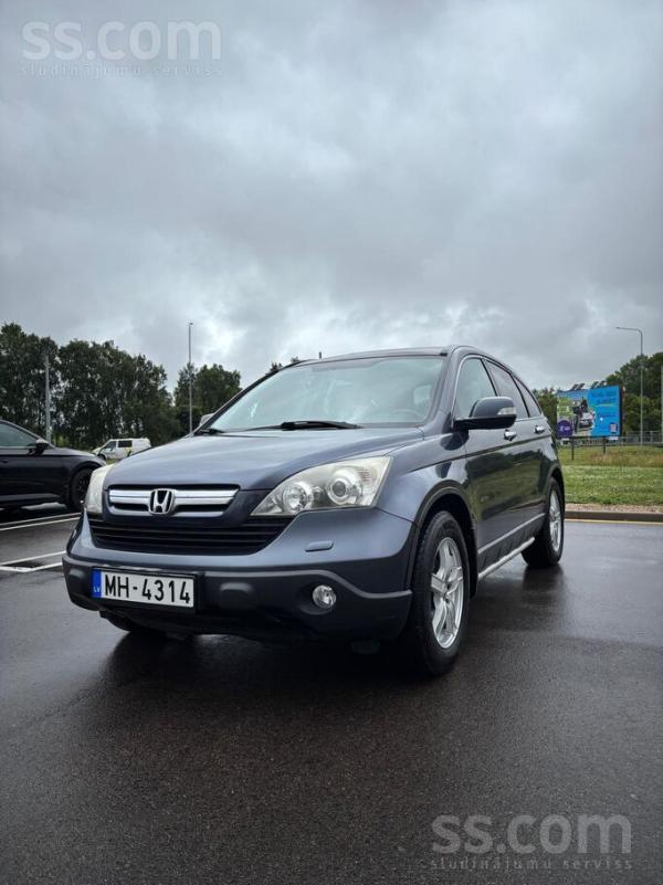 Zils Honda CR-V 2007 Daugavpils, ar dzinēja tilpumu 2.20 L un nobraukumu 220 tūkst. km par 4699 €, foto 1 vietnē AUTOMOTO.COM.LV