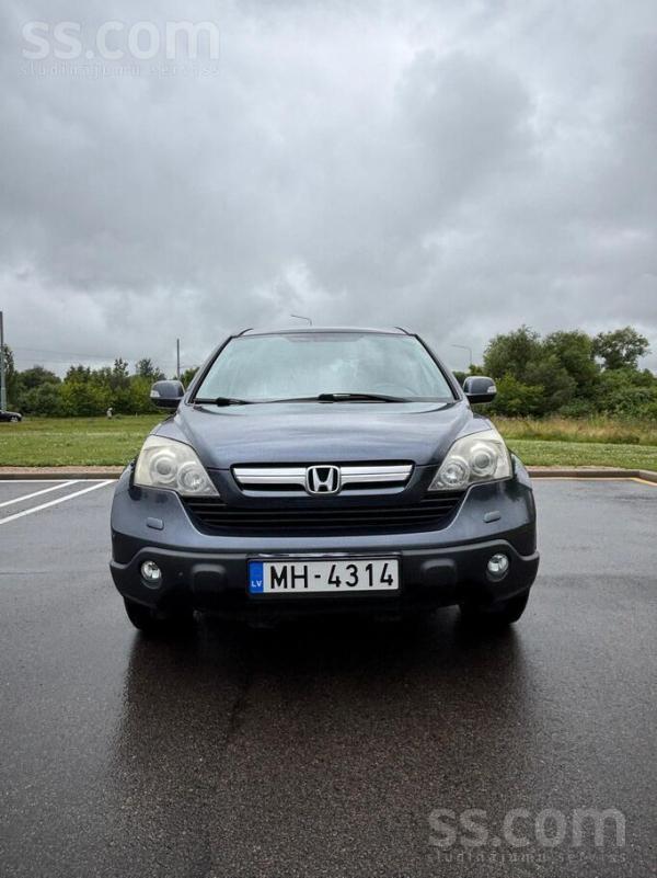 Zils Honda CR-V 2007 Daugavpils, ar dzinēja tilpumu 2.20 L un nobraukumu 220 tūkst. km par 4699 €, foto 2 vietnē AUTOMOTO.COM.LV