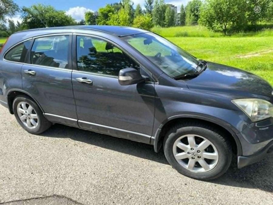 Blue Honda CR-V 2007 in Vilnius, with an engine capacity of 2.20 L and mileage of 240 thousand km for 4999 €, photo 3 on AUTOMOTO.COM.LV