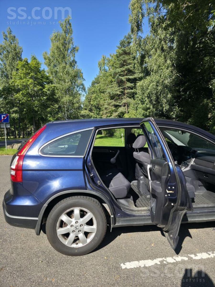 Blue Honda CR-V 2007 in Riga, with an engine capacity of 2.00 L and mileage of 274 thousand km for 3500 €, photo 6 on AUTOMOTO.COM.LV