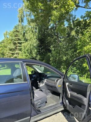 Blue Honda CR-V 2007 in Riga, with an engine capacity of 2.00 L and mileage of 274 thousand km for 3500 €, photo 7 on AUTOMOTO.COM.LV