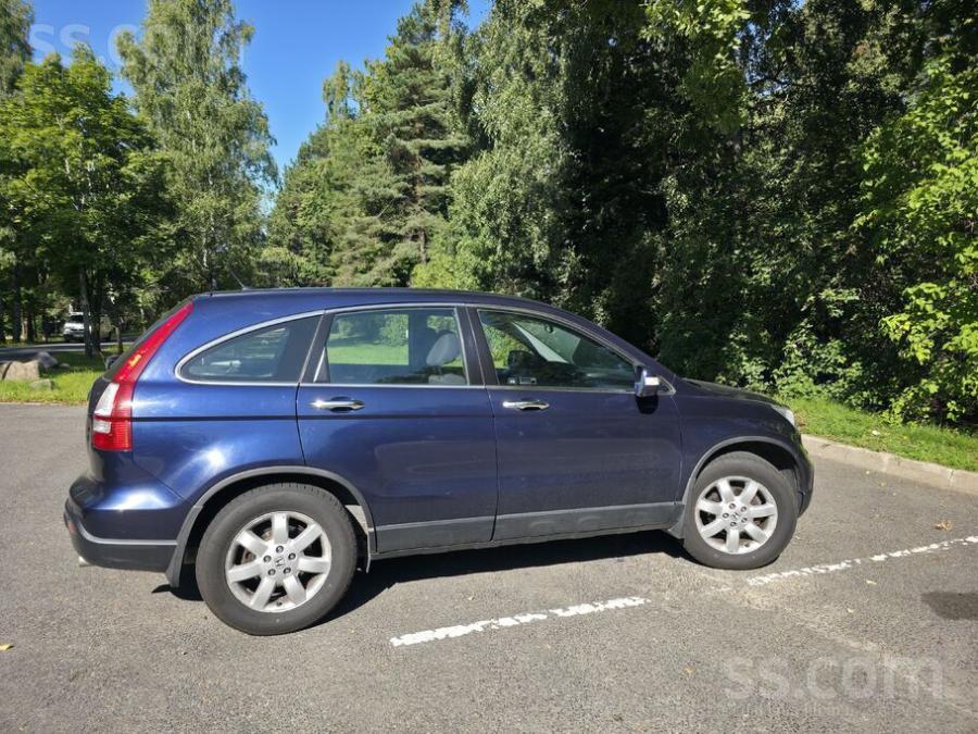 Blue Honda CR-V 2007 in Riga, with an engine capacity of 2.00 L and mileage of 274 thousand km for 3500 €, photo 8 on AUTOMOTO.COM.LV