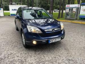 Zils Honda CR-V 2007 Rīga, ar dzinēja tilpumu 2.00 L un nobraukumu 0 tūkst. km par 3499 €, foto  vietnē AUTOMOTO.COM.LV