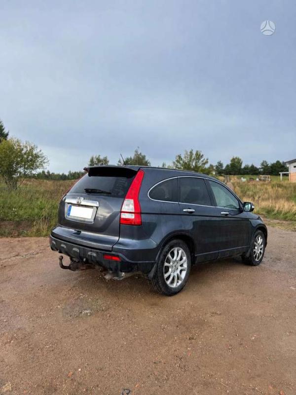 Blue Honda CR-V 2007 in Trakai, with an engine capacity of 2.20 L and mileage of 440 thousand km for 2490 €, photo 4 on AUTOMOTO.COM.LV