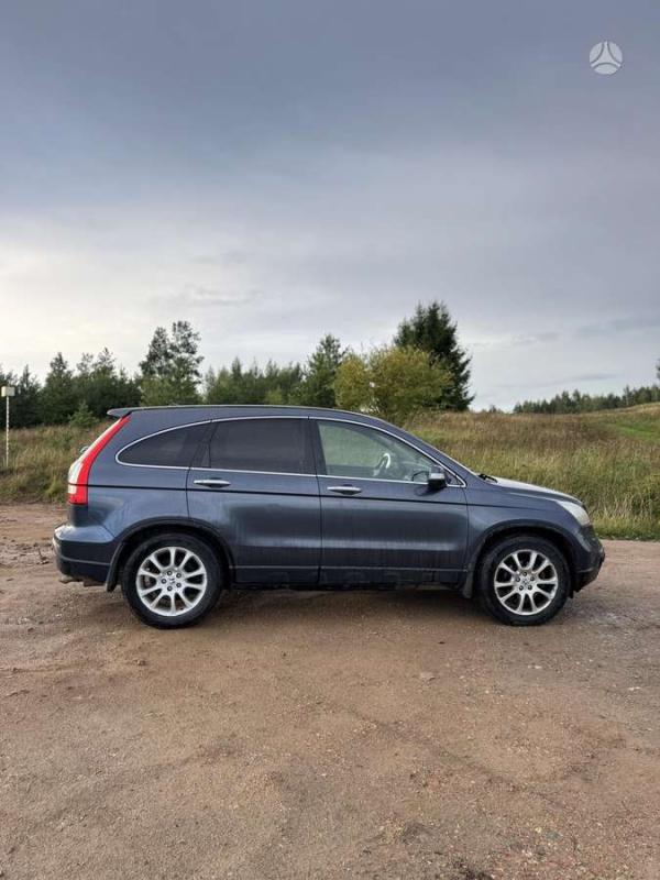 Blue Honda CR-V 2007 in Trakai, with an engine capacity of 2.20 L and mileage of 440 thousand km for 2490 €, photo 5 on AUTOMOTO.COM.LV