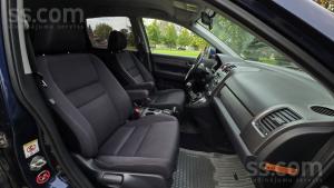 Blue Honda CR-V 2007 in Jelgava, with an engine capacity of 2.00 L and mileage of 0 thousand km for 2390 €, photo 13 on AUTOMOTO.COM.LV
