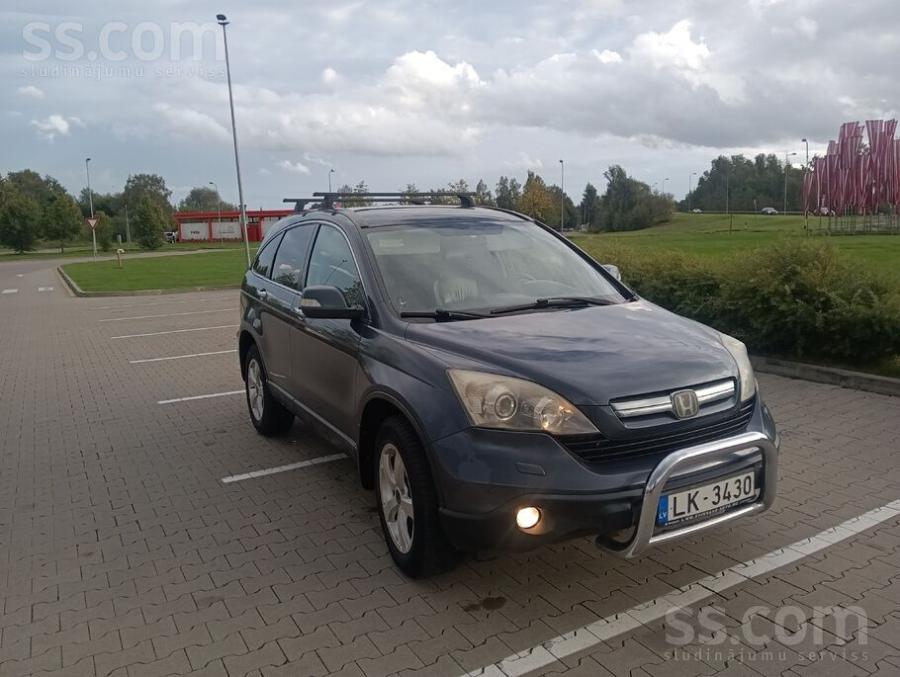 Blue Honda CR-V 2007 in Riga, with an engine capacity of 2.20 L and mileage of 420 thousand km for 4500 €, photo 9 on AUTOMOTO.COM.LV