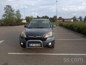 Blue Honda CR-V 2007 in Riga, with an engine capacity of 2.20 L and mileage of 420 thousand km for 4500 €, photo 13 on AUTOMOTO.COM.LV