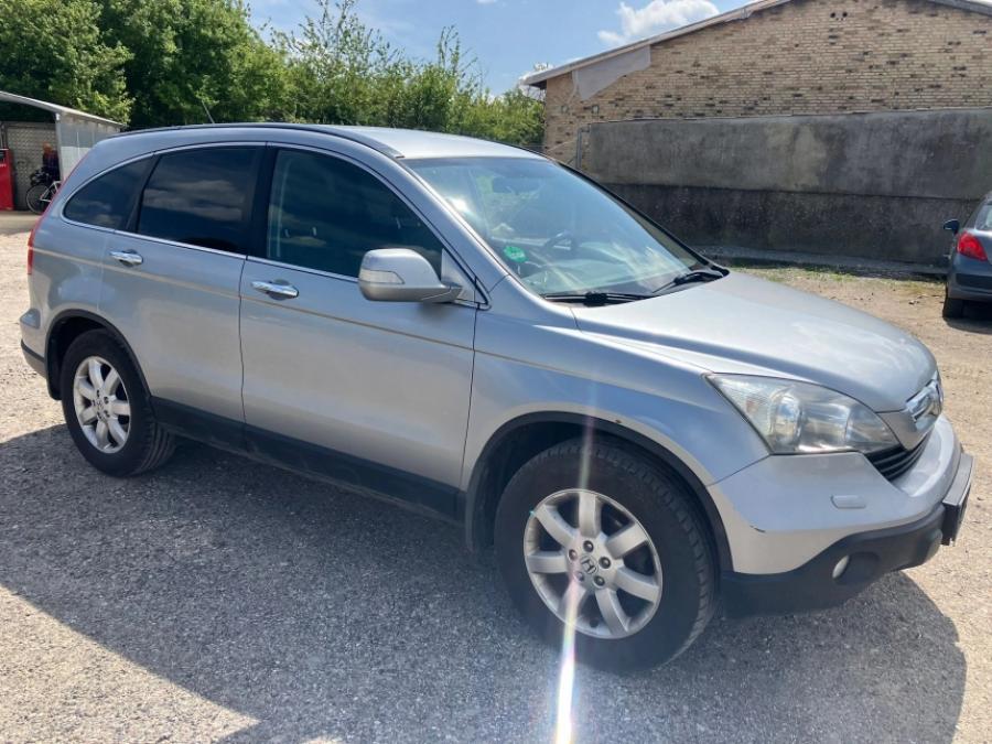 Blue Honda CR-V 2008 in Riga, with an engine capacity of 2.20 L and mileage of 261 thousand km for 5900 €, photo 1 on AUTOMOTO.COM.LV