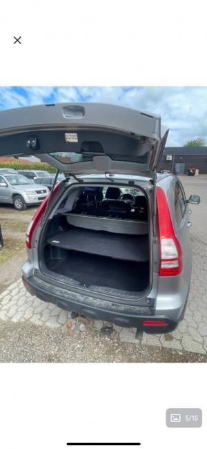 Blue Honda CR-V 2008 in Riga, with an engine capacity of 2.20 L and mileage of 261 thousand km for 5900 €, photo 5 on AUTOMOTO.COM.LV