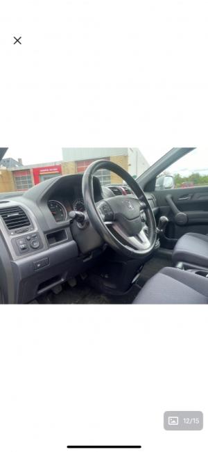 Blue Honda CR-V 2008 in Riga, with an engine capacity of 2.20 L and mileage of 261 thousand km for 5900 €, photo 7 on AUTOMOTO.COM.LV