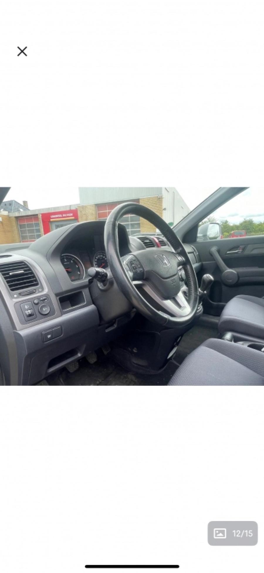 Blue Honda CR-V 2008 in Riga, with an engine capacity of 2.20 L and mileage of 261 thousand km for 5900 €, photo 7 on AUTOMOTO.COM.LV