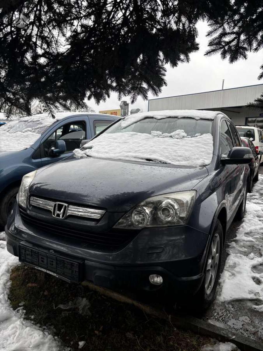 Blue Honda CR-V 2009 in Utena, with an engine capacity of 2.00 L and mileage of 310 thousand km for 2350 €, photo 1 on AUTOMOTO.COM.LV