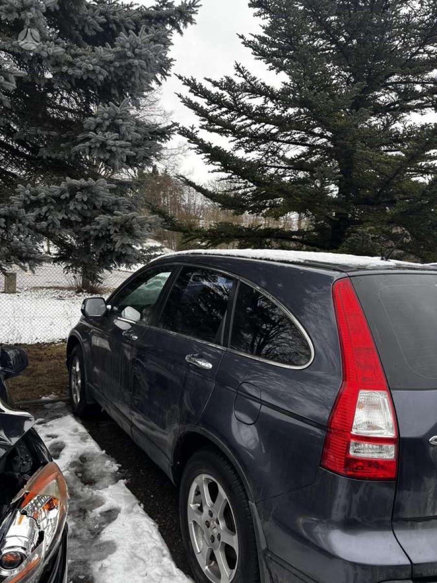 Blue Honda CR-V 2009 in Utena, with an engine capacity of 2.00 L and mileage of 310 thousand km for 2350 €, photo 5 on AUTOMOTO.COM.LV