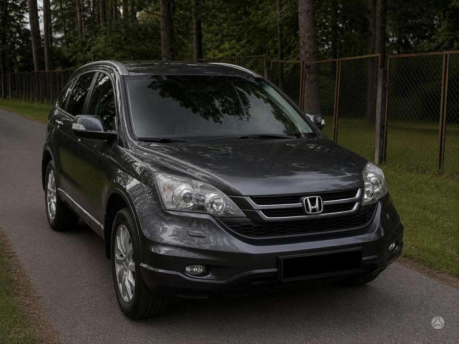 Blue Honda CR-V 2010 in Vilnius, with an engine capacity of 2.20 L and mileage of 263 thousand km for 7900 €, photo 5 on AUTOMOTO.COM.LV
