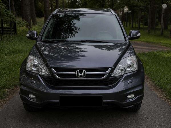 Blue Honda CR-V 2010 in Vilnius, with an engine capacity of 2.20 L and mileage of 263 thousand km for 7890 €, photo 3 on AUTOMOTO.COM.LV