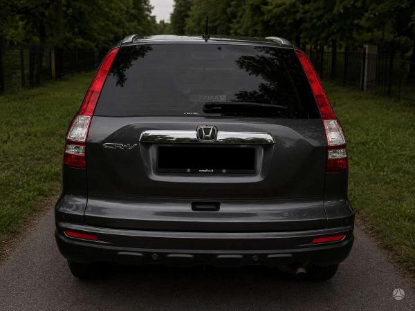 Blue Honda CR-V 2010 in Vilnius, with an engine capacity of 2.20 L and mileage of 263 thousand km for 7890 €, photo 8 on AUTOMOTO.COM.LV