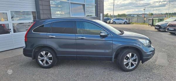 Blue Honda CR-V 2012 in Vilnius, with an engine capacity of 2.20 L and mileage of 230 thousand km for 6100 €, photo 6 on AUTOMOTO.COM.LV