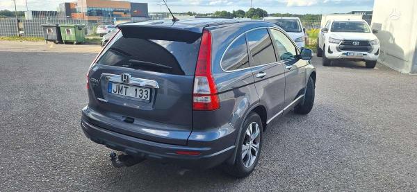 Blue Honda CR-V 2012 in Vilnius, with an engine capacity of 2.20 L and mileage of 230 thousand km for 6100 €, photo 8 on AUTOMOTO.COM.LV
