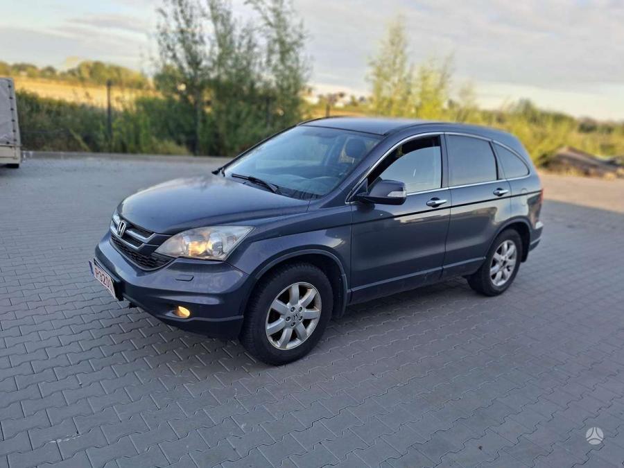 Blue Honda CR-V 2012 in Kaunas, with an engine capacity of 2.20 L and mileage of 290 thousand km for 5600 €, photo 1 on AUTOMOTO.COM.LV