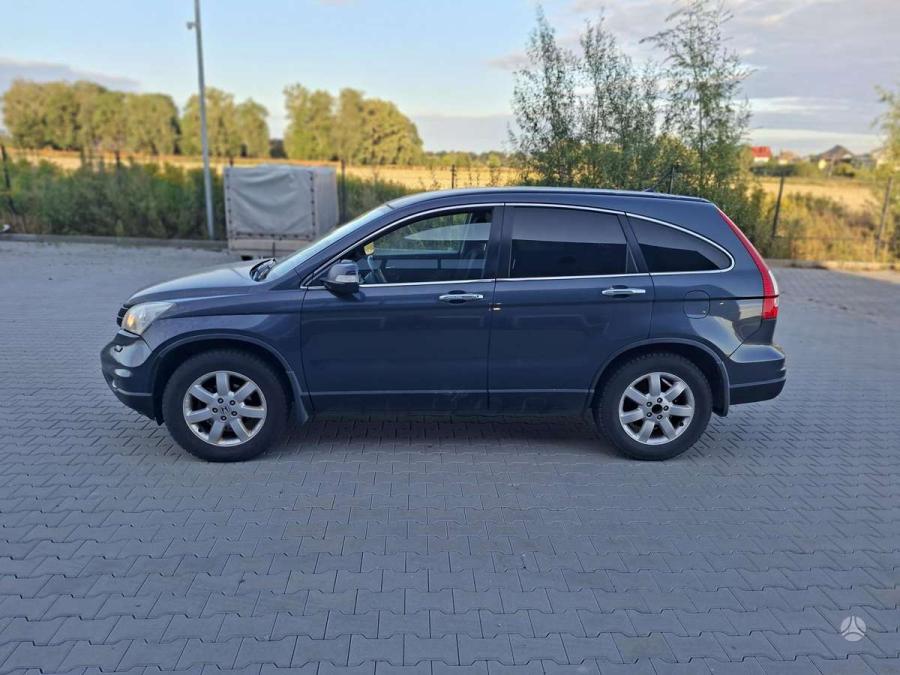 Blue Honda CR-V 2012 in Kaunas, with an engine capacity of 2.20 L and mileage of 290 thousand km for 5600 €, photo 3 on AUTOMOTO.COM.LV