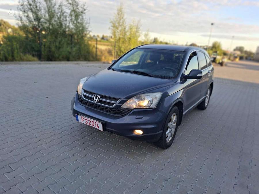 Blue Honda CR-V 2012 in Kaunas, with an engine capacity of 2.20 L and mileage of 290 thousand km for 5600 €, photo 5 on AUTOMOTO.COM.LV