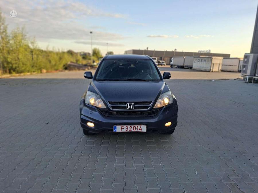 Blue Honda CR-V 2012 in Kaunas, with an engine capacity of 2.20 L and mileage of 290 thousand km for 5600 €, photo 6 on AUTOMOTO.COM.LV