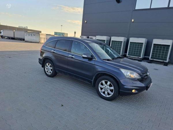 Blue Honda CR-V 2012 in Kaunas, with an engine capacity of 2.20 L and mileage of 290 thousand km for 5600 €, photo 9 on AUTOMOTO.COM.LV