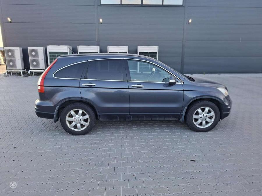 Blue Honda CR-V 2012 in Kaunas, with an engine capacity of 2.20 L and mileage of 290 thousand km for 5600 €, photo 11 on AUTOMOTO.COM.LV