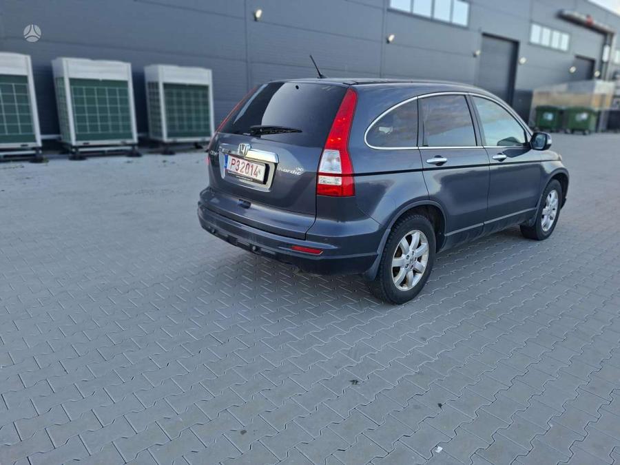 Blue Honda CR-V 2012 in Kaunas, with an engine capacity of 2.20 L and mileage of 290 thousand km for 5600 €, photo 12 on AUTOMOTO.COM.LV