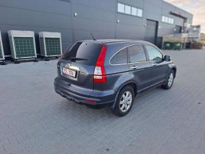 Blue Honda CR-V 2012 in Kaunas, with an engine capacity of 2.20 L and mileage of 290 thousand km for 5600 €, photo 13 on AUTOMOTO.COM.LV