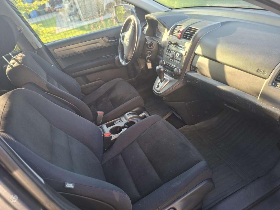 Blue Honda CR-V 2012 in Kaunas, with an engine capacity of 2.20 L and mileage of 290 thousand km for 5600 €, photo 17 on AUTOMOTO.COM.LV