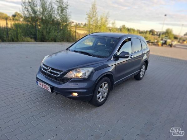 Blue Honda CR-V 2012 in Kaunas, with an engine capacity of 2.20 L and mileage of 290 thousand km for 5350 €, photo 5 on AUTOMOTO.COM.LV