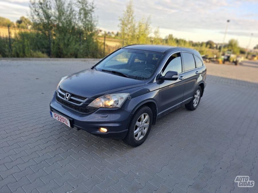 Blue Honda CR-V 2012 in Kaunas, with an engine capacity of 2.20 L and mileage of 290 thousand km for 5350 €, photo 5 on AUTOMOTO.COM.LV