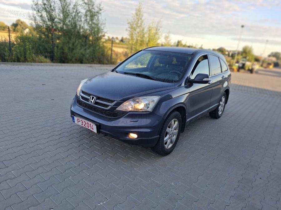Blue Honda CR-V 2012 in Kaunas, with an engine capacity of 2.20 L and mileage of 290 thousand km for 5350 €, photo 6 on AUTOMOTO.COM.LV
