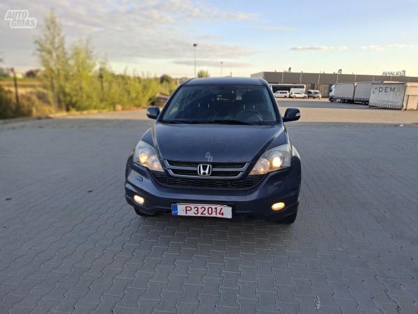 Blue Honda CR-V 2012 in Kaunas, with an engine capacity of 2.20 L and mileage of 290 thousand km for 5350 €, photo 8 on AUTOMOTO.COM.LV