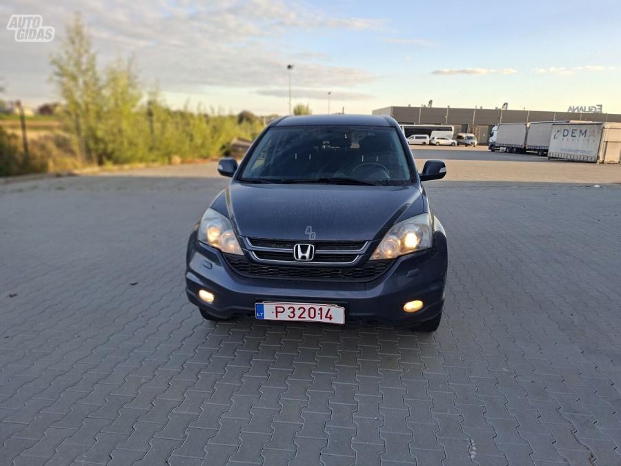 Blue Honda CR-V 2012 in Kaunas, with an engine capacity of 2.20 L and mileage of 290 thousand km for 5350 €, photo 8 on AUTOMOTO.COM.LV