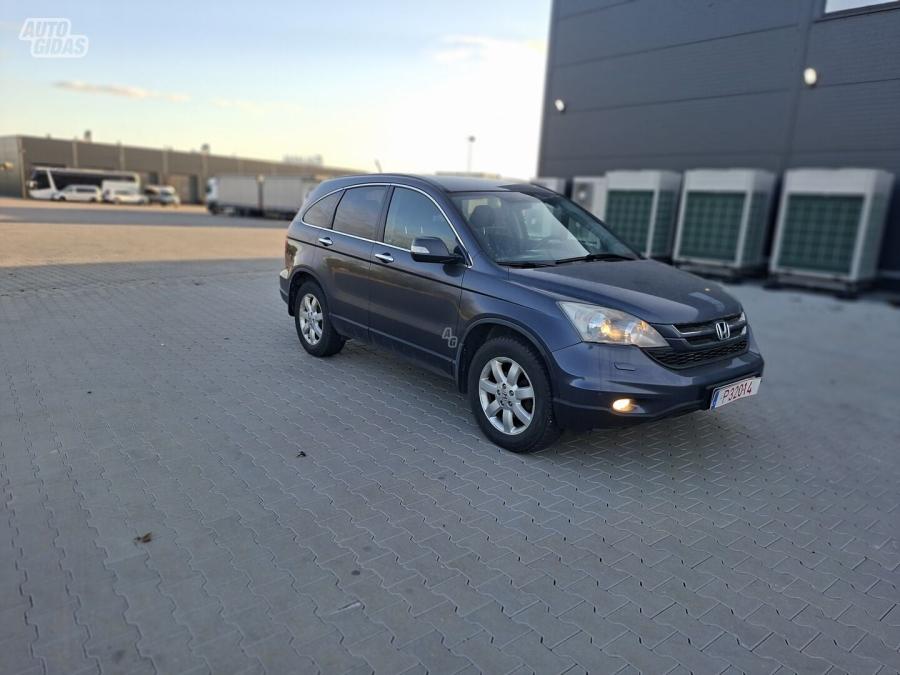 Blue Honda CR-V 2012 in Kaunas, with an engine capacity of 2.20 L and mileage of 290 thousand km for 5350 €, photo 11 on AUTOMOTO.COM.LV