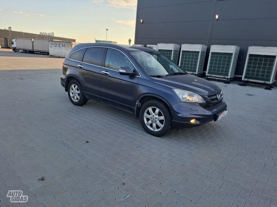 Blue Honda CR-V 2012 in Kaunas, with an engine capacity of 2.20 L and mileage of 290 thousand km for 5350 €, photo 12 on AUTOMOTO.COM.LV