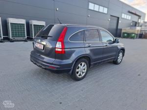 Blue Honda CR-V 2012 in Kaunas, with an engine capacity of 2.20 L and mileage of 290 thousand km for 5350 €, photo 16 on AUTOMOTO.COM.LV